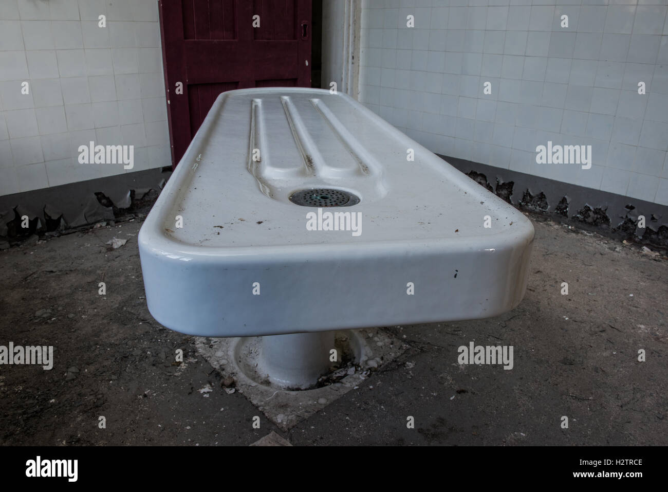 An increasingly rare porcelain autopsy table within the derelict Maiden ...