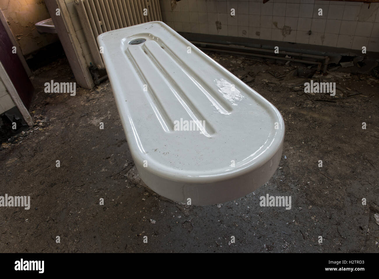 An increasingly rare porcelain autopsy table within the derelict Maiden ...