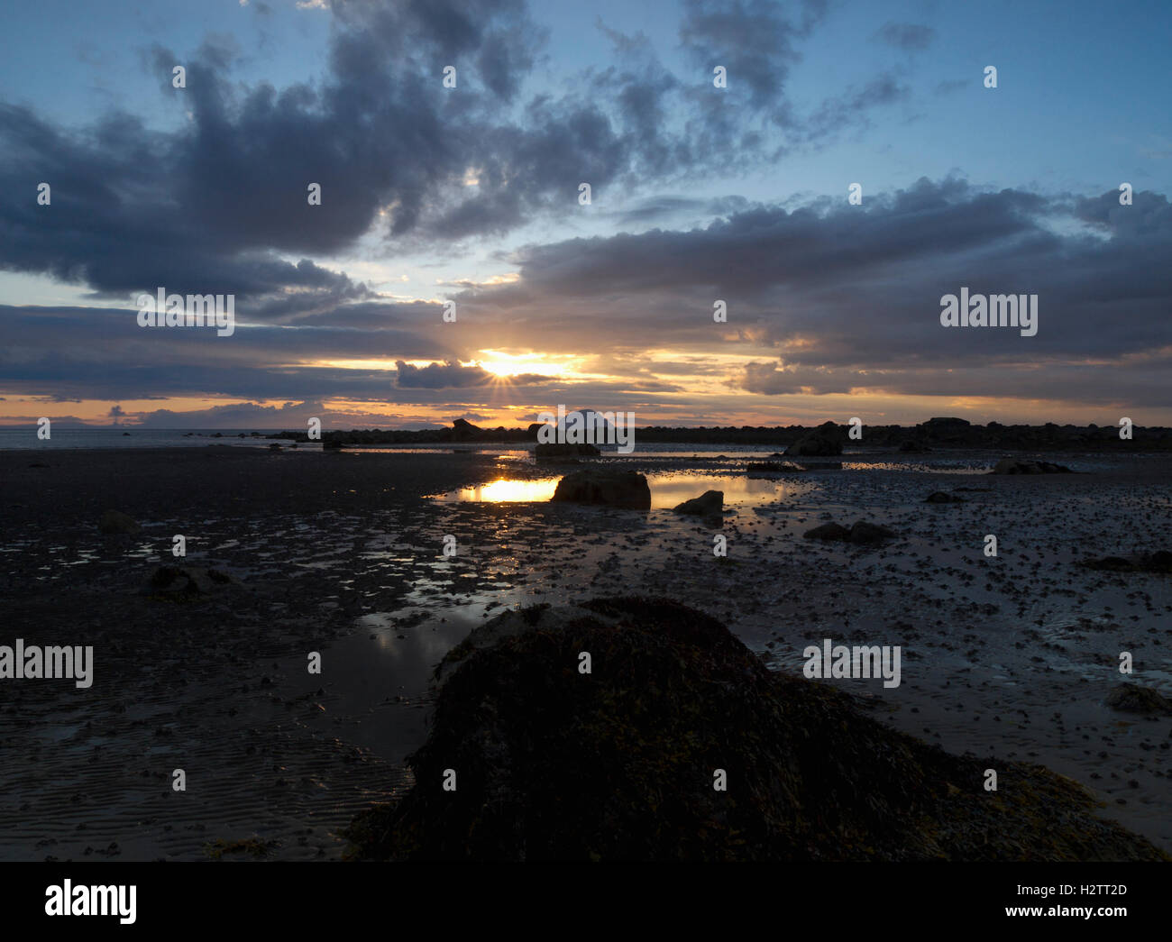 Sunset over Ailsa Craig & The Isle of Arran from the beach at ...