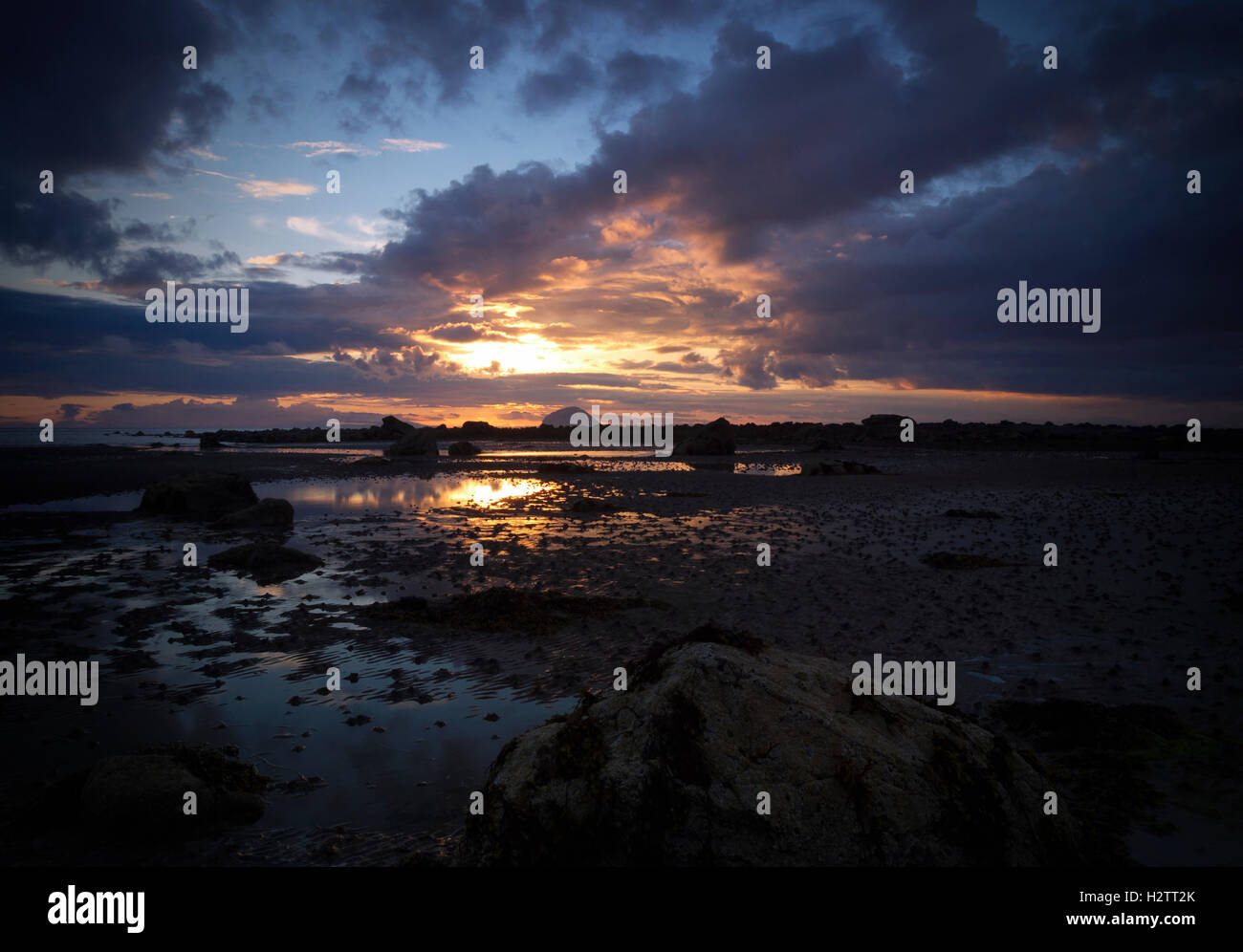 Sunset over Ailsa Craig & The Isle of Arran from the beach at ...
