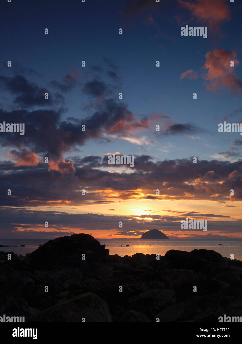 Sunset over Ailsa Craig & The Isle of Arran from the beach at ...
