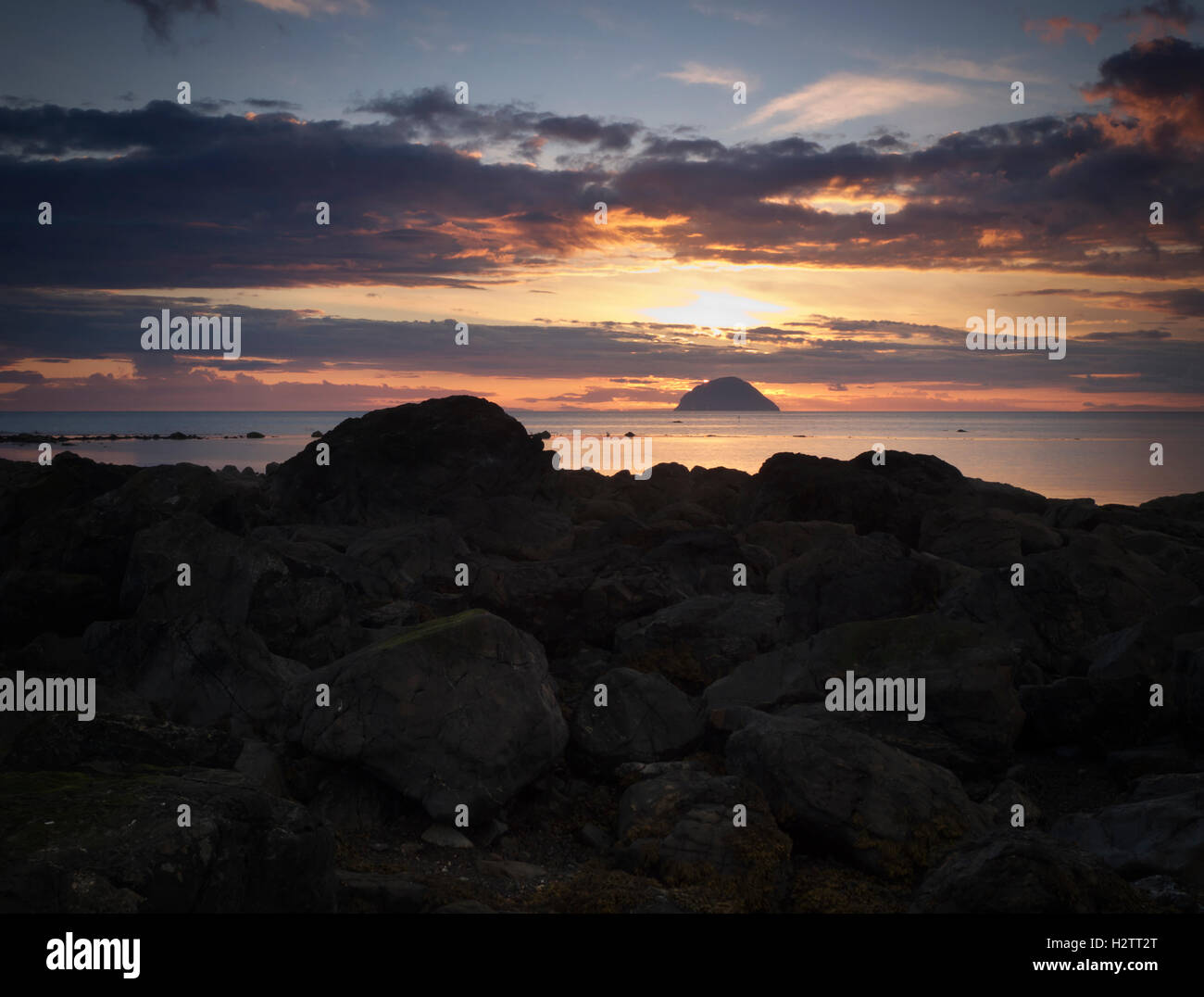Sunset over Ailsa Craig & The Isle of Arran from the beach at ...