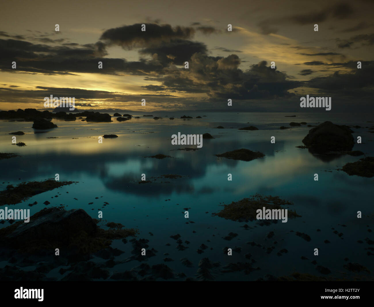 Sunset over Ailsa Craig & The Isle of Arran from the beach at ...