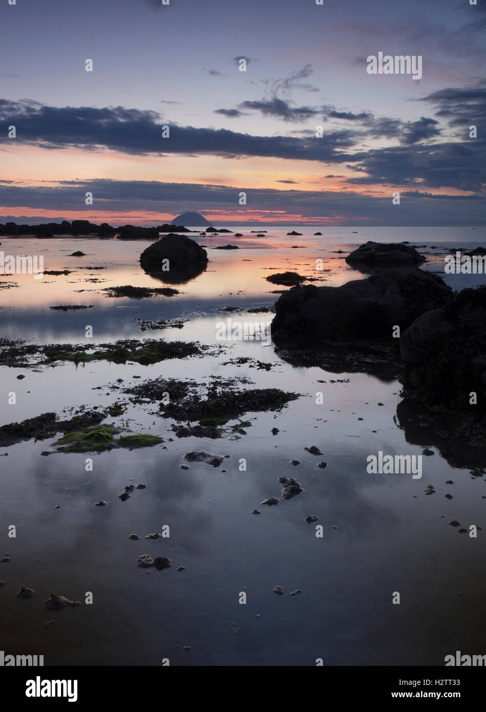 Sunset over Ailsa Craig & The Isle of Arran from the beach at ...