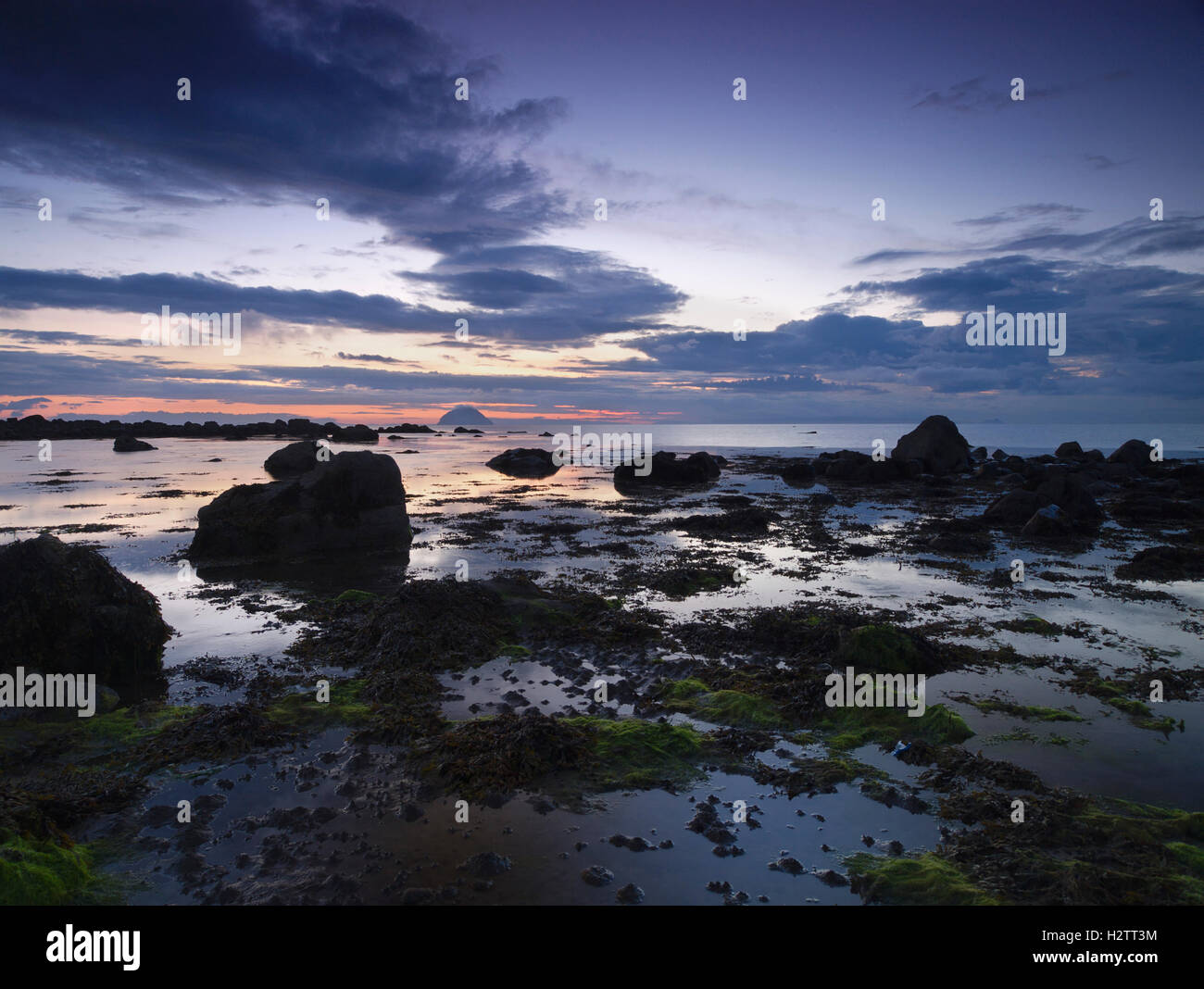 Sunset over Ailsa Craig & The Isle of Arran from the beach at ...