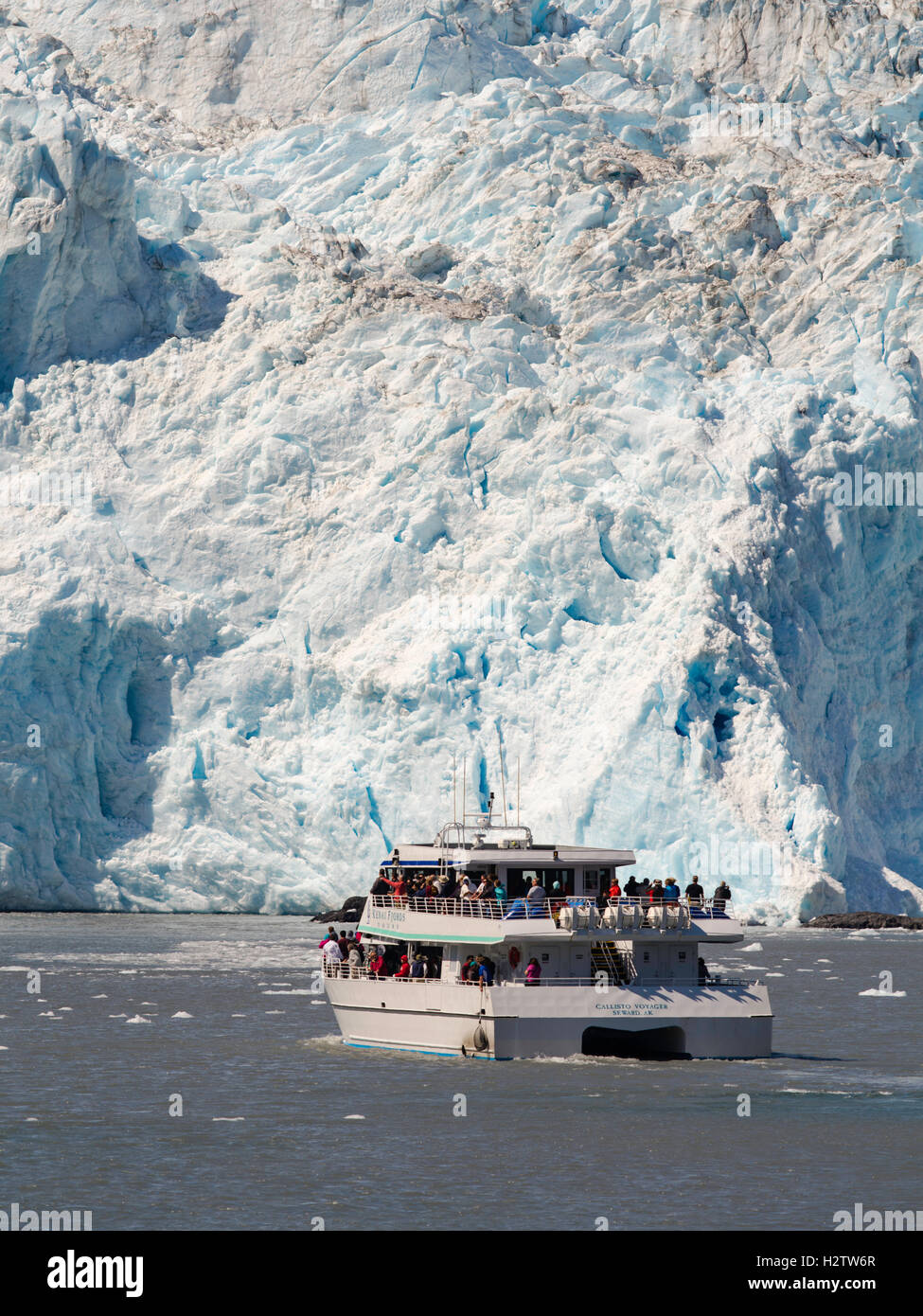 A tourist boat approaching the Holgate Glacier from on board a tour ...