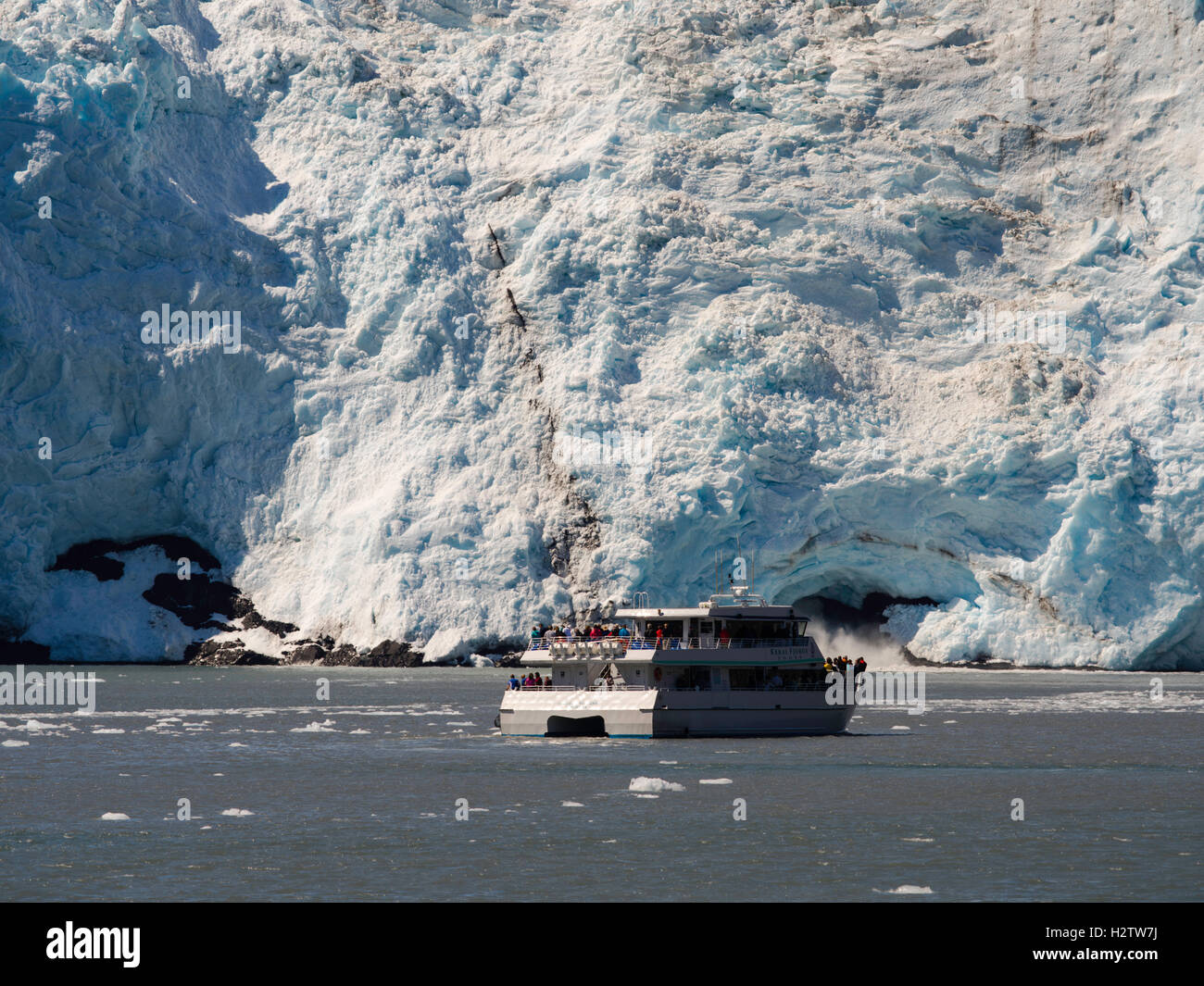 A tourist boat approaching the Holgate Glacier from on board a tour ...