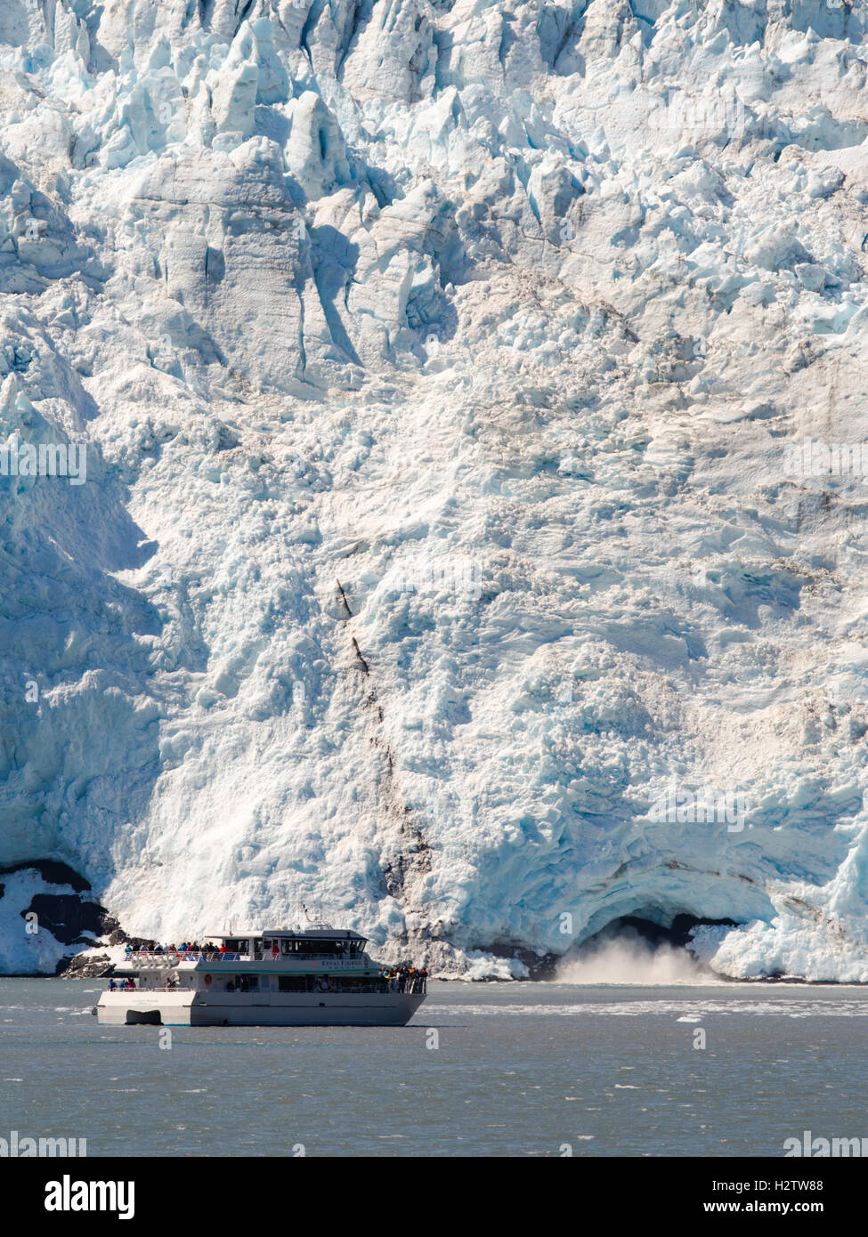 A tourist boat approaching the Holgate Glacier from on board a tour ...