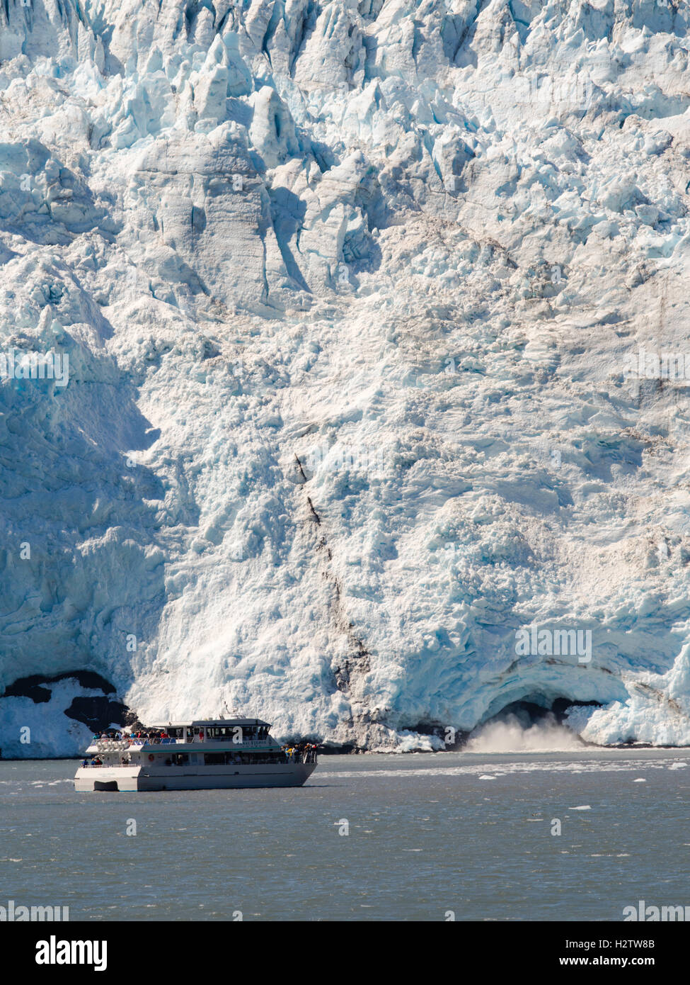 A tourist boat approaching the Holgate Glacier from on board a tour ...