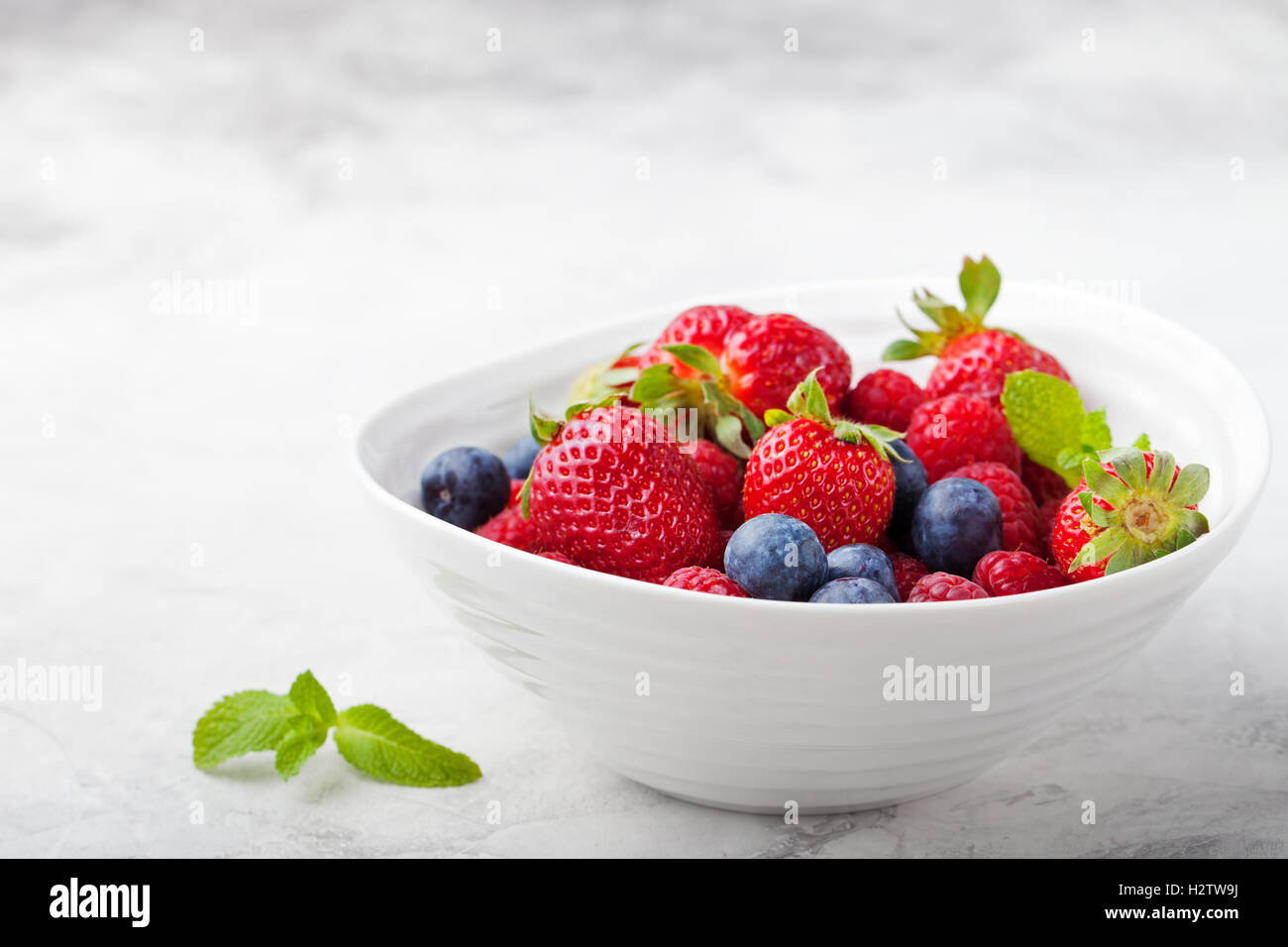 Mix fresh berries blueberry, strawberry, raspberry Stock Photo - Alamy