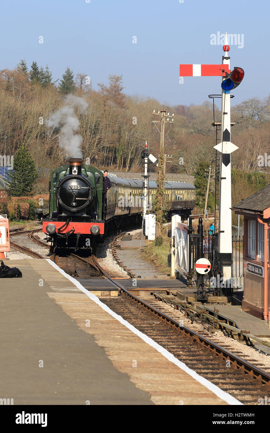 Steam locomotive, 3205, pulling a passenger train approaching Staverton ...