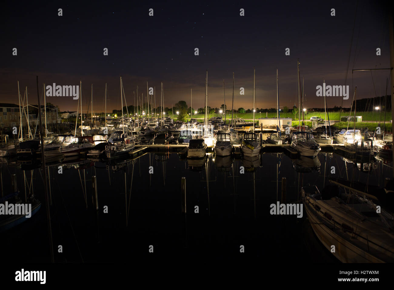 Night view of yachts at marina Stock Photo - Alamy