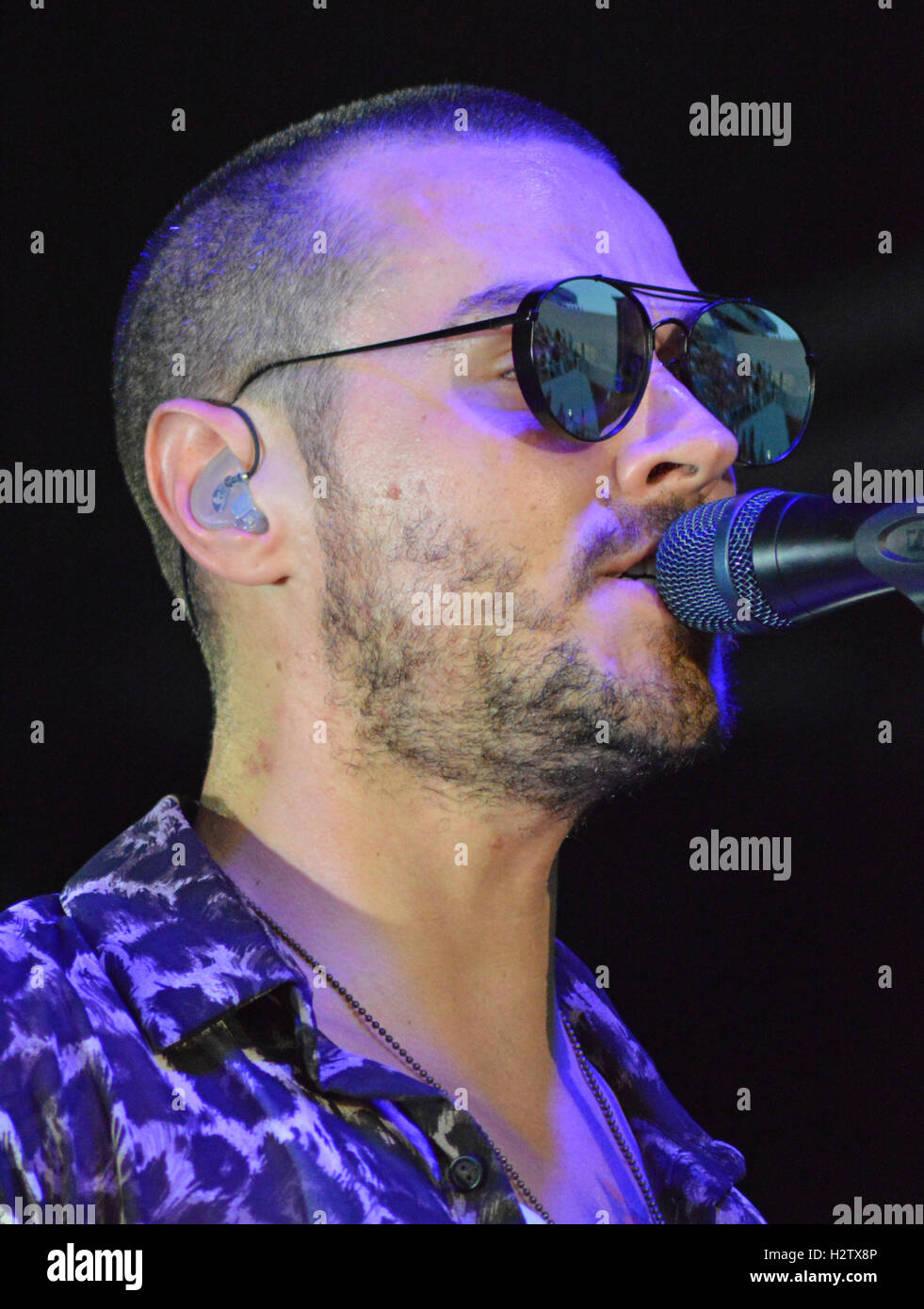 Busted performing live in concert after racing at Sandown Park ...