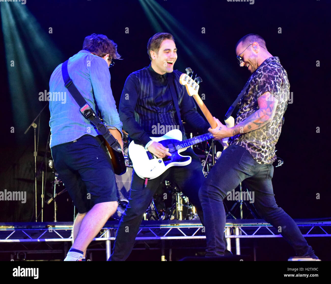 Busted performing live in concert after racing at Sandown Park ...