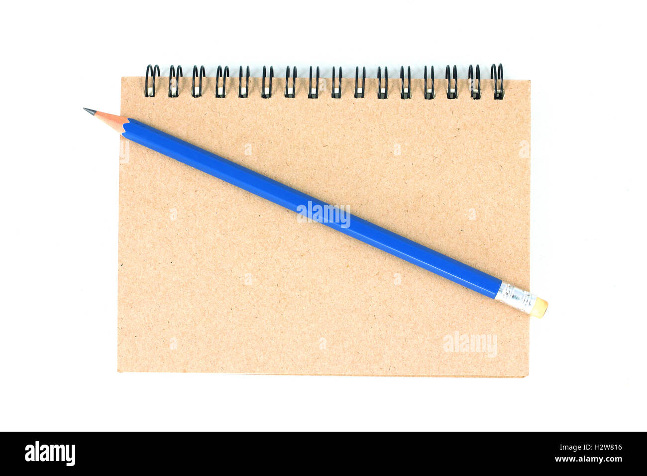 pencil and notebook on white background Stock Photo - Alamy