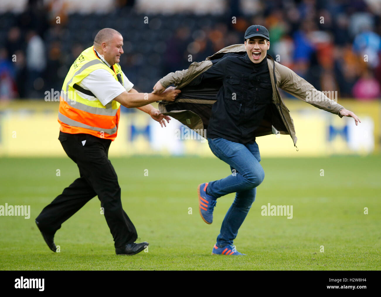 A fan invades the pitch after the final whistle during the Premier ...