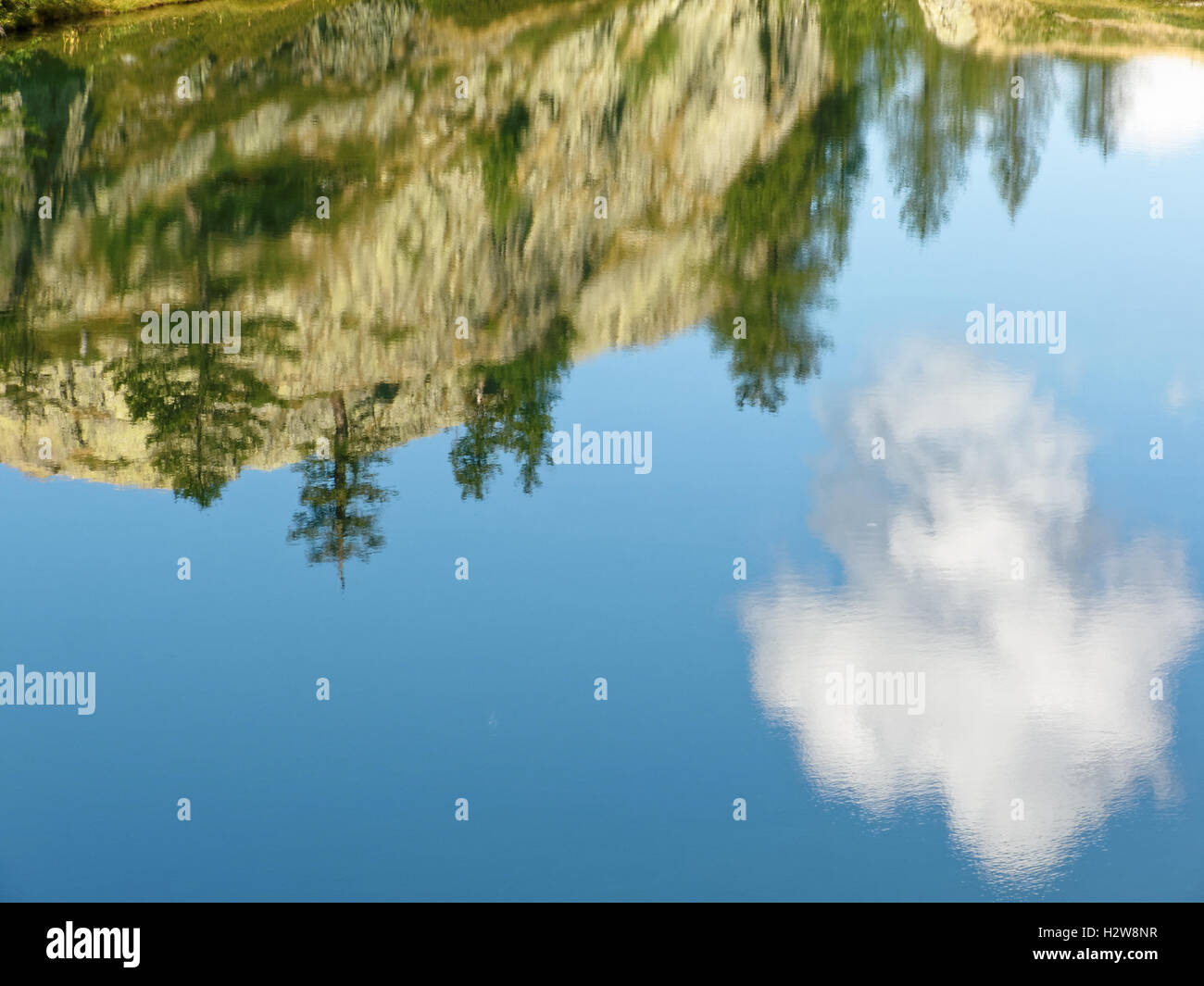a reflection on a lake Stock Photo - Alamy