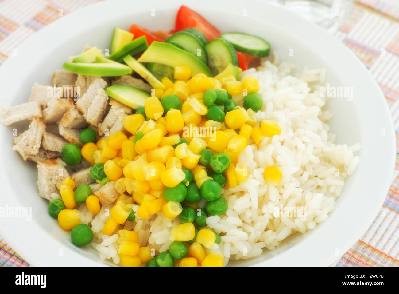 Rice with fresh vegetables and meat slices. Close up Stock Photo - Alamy