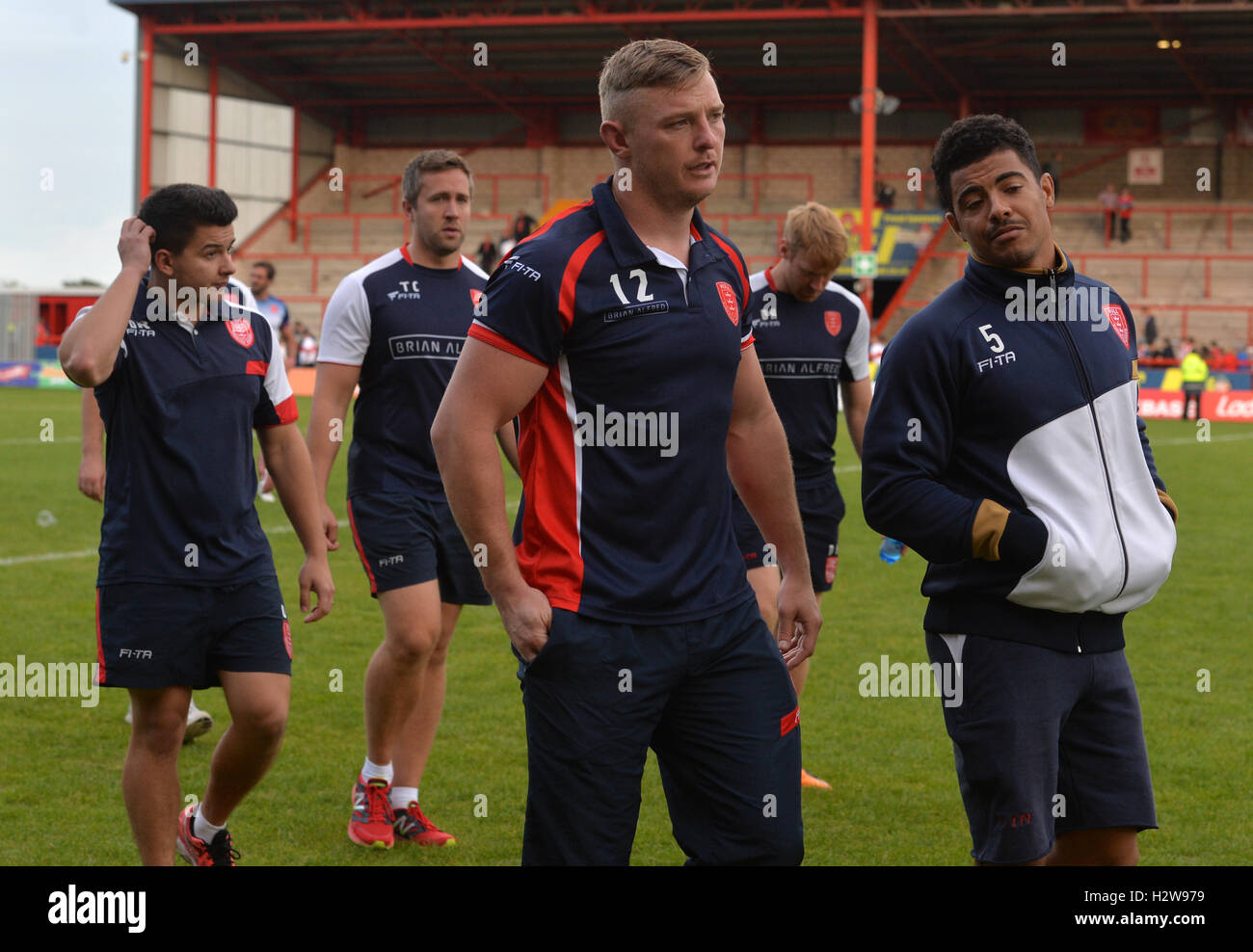 Hull Kingston Rovers' players and staff are dejected as they leave the ...