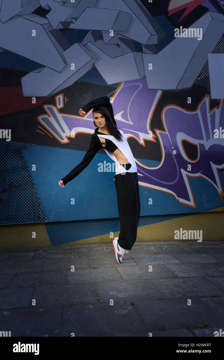 modern dancer girl and graffiti Stock Photo - Alamy