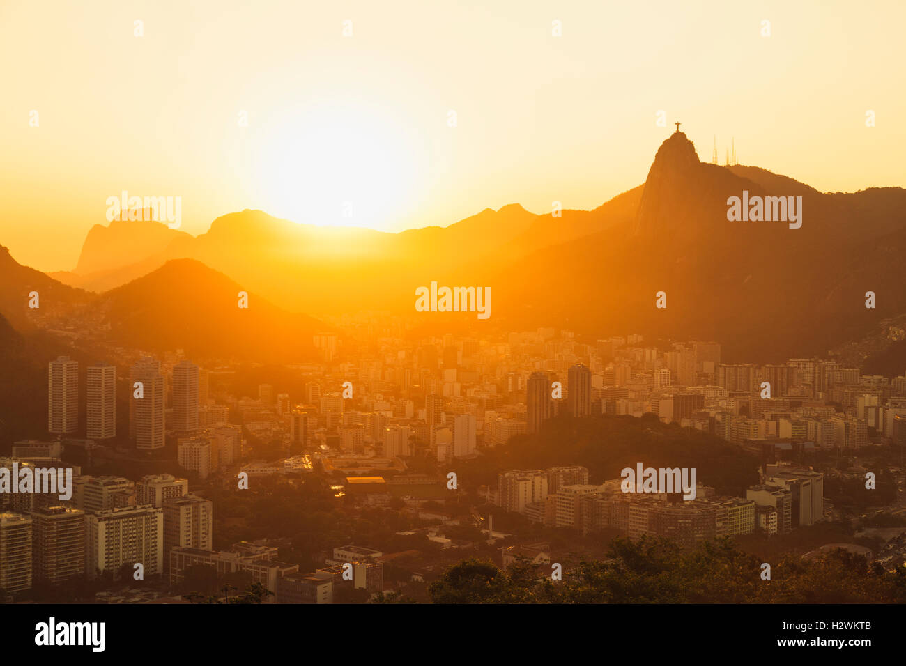 Sunset over city in Rio De Janeiro cityscape Stock Photo - Alamy