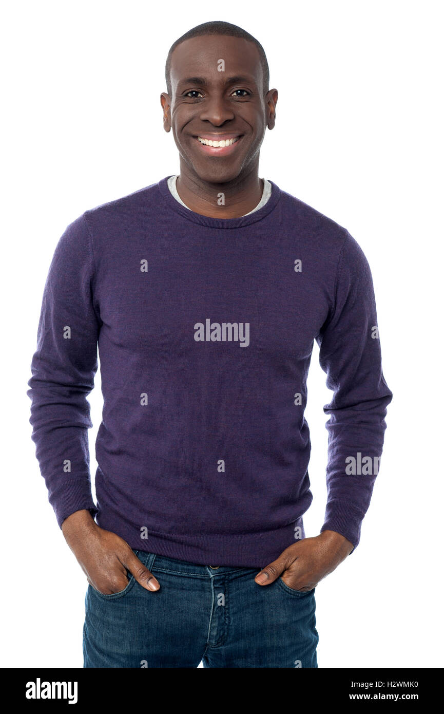 Happy male model posing casually Stock Photo - Alamy