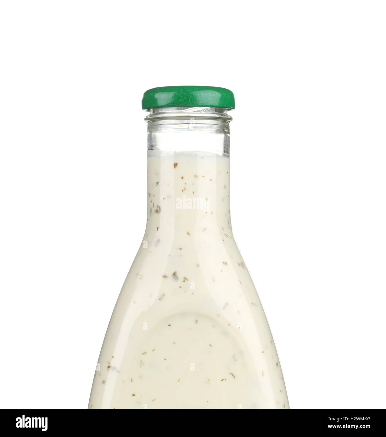 Glass bottle of white sauce Stock Photo - Alamy
