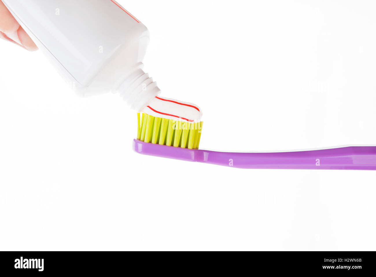 Toothpase on toothbrush Stock Photo - Alamy