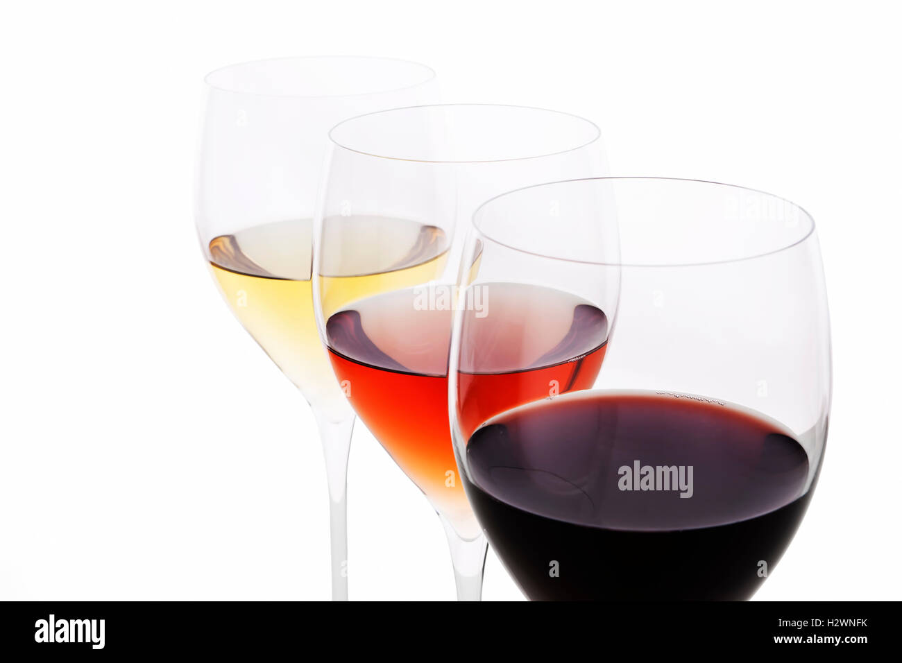 Three colors of wine. Red, rose and white Stock Photo - Alamy