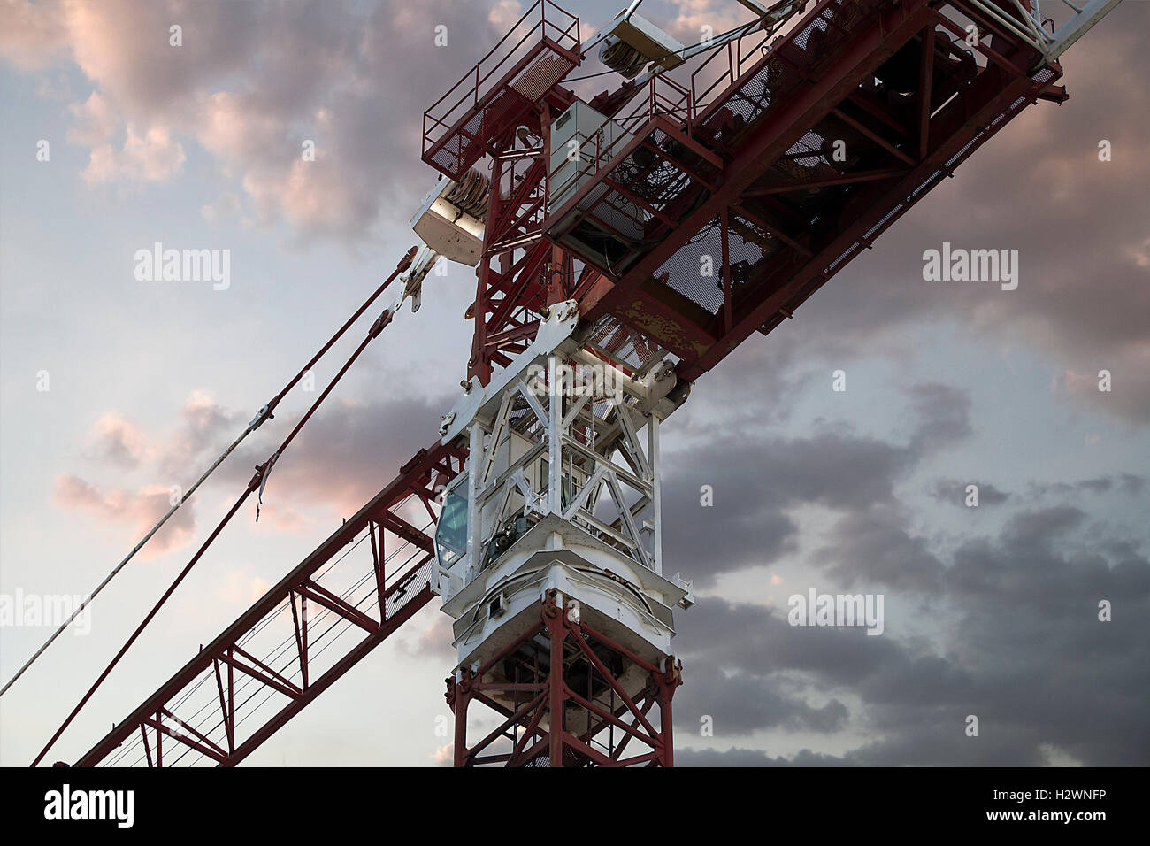 Industrial red crane, sunset background, construction and works Stock ...