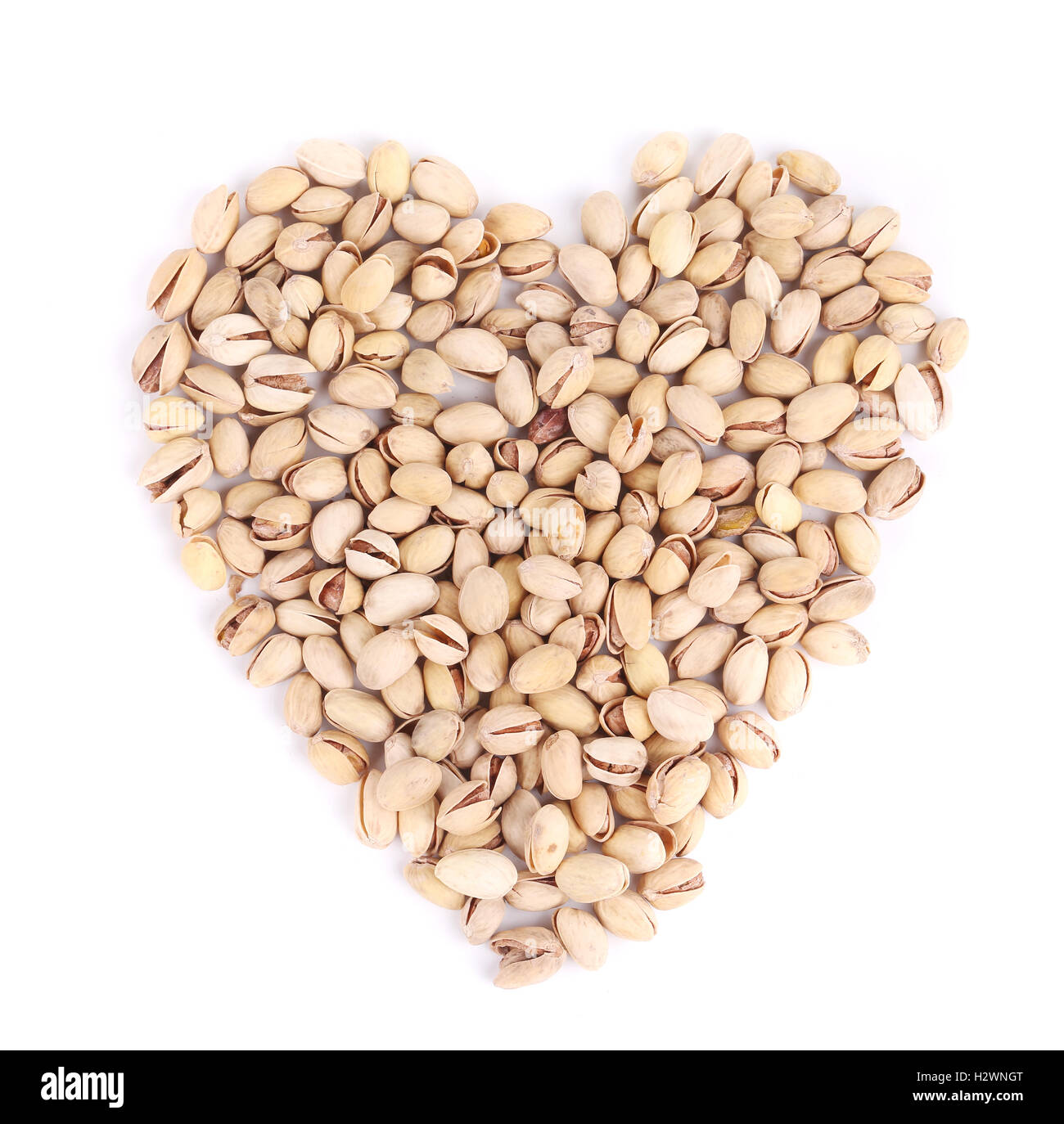 Heart shape of fresh pistachios Stock Photo - Alamy
