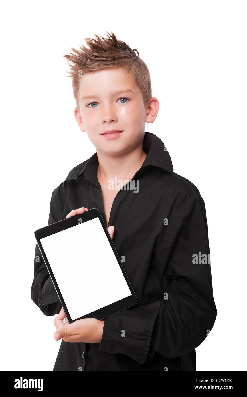 Charming boy showing tablet Stock Photo - Alamy
