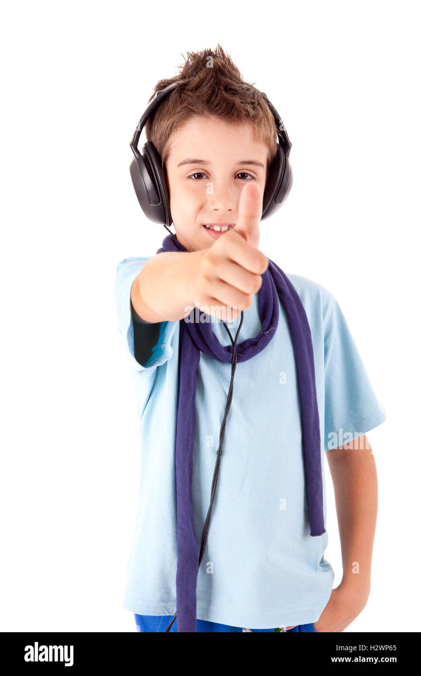 Cute little boy enjoying music using headphones and showing thum Stock ...