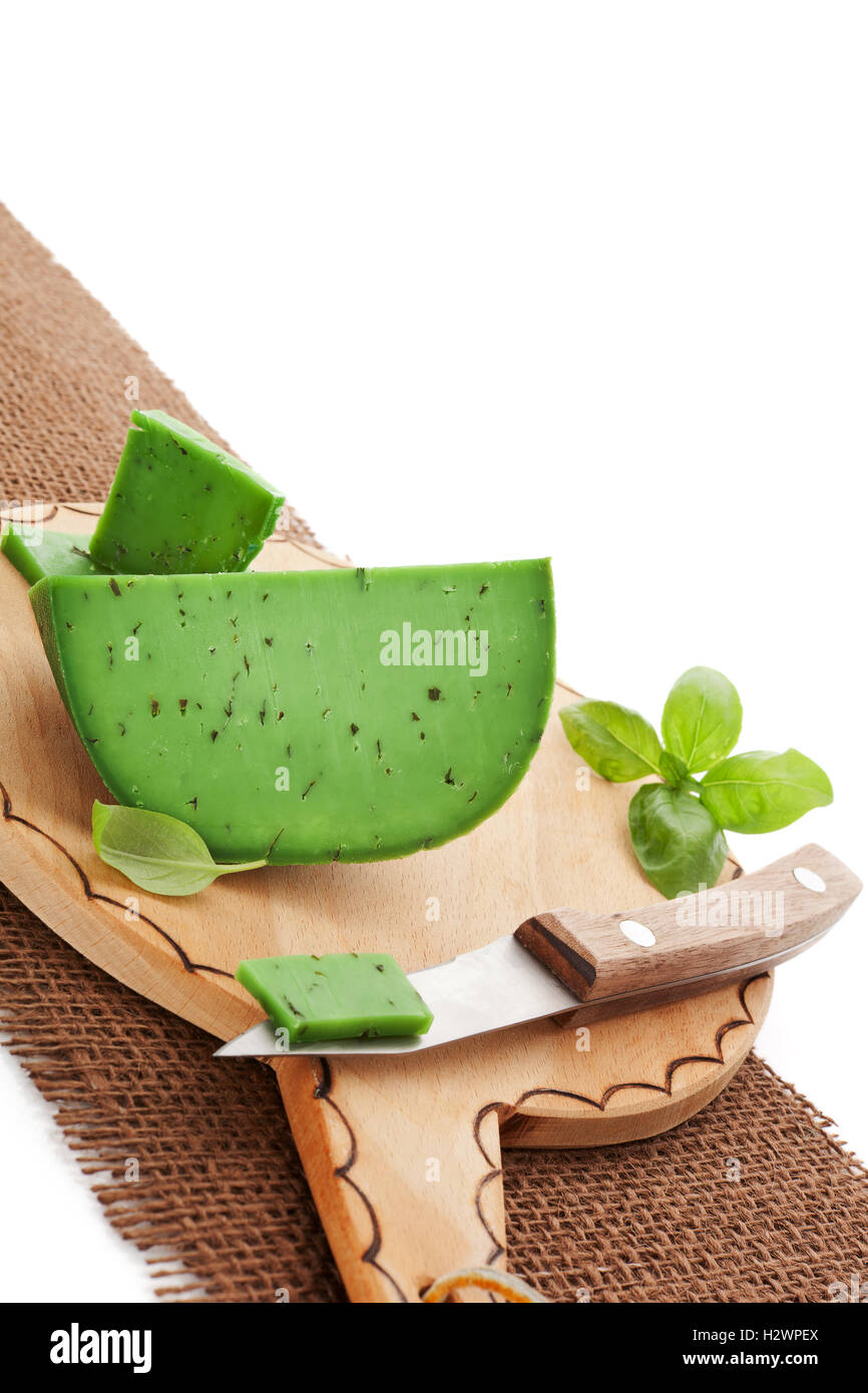 Luxurious cheese still life in green in brown Stock Photo - Alamy