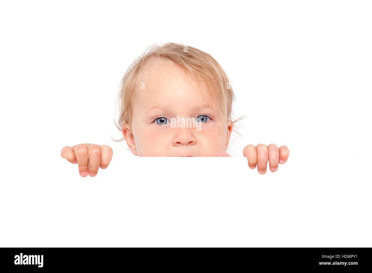 Baby girl hands behind head hi-res stock photography and images - Alamy