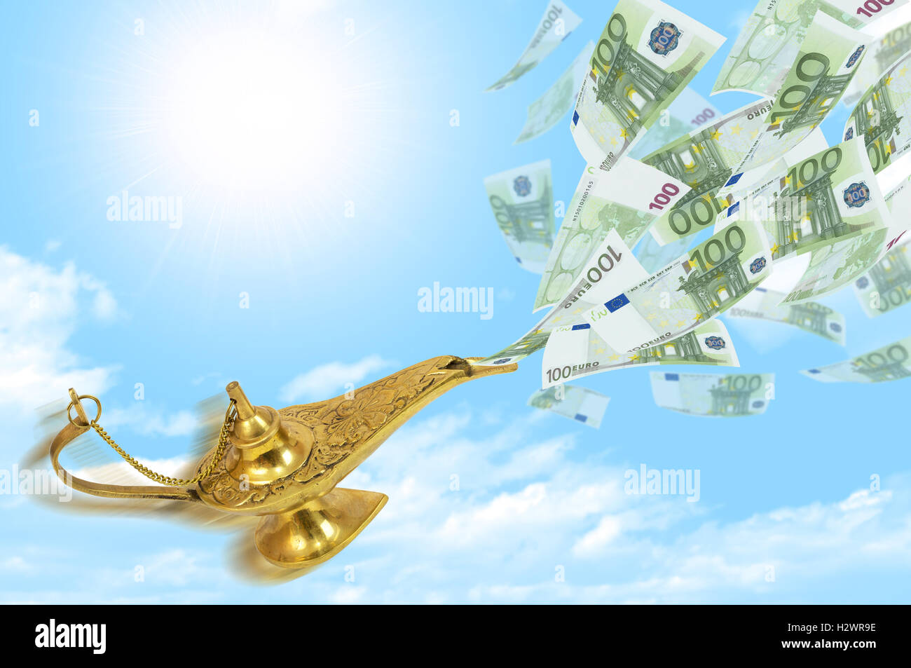 Money fly out of Aladdin's magic lamp Stock Photo - Alamy