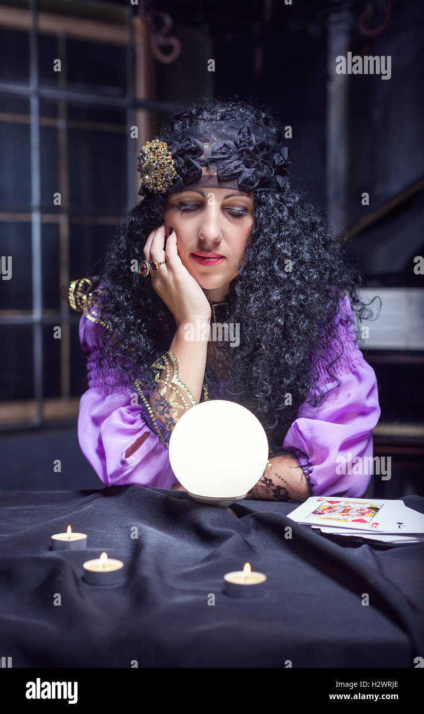 Sorceress while practising witchcraft Stock Photo - Alamy