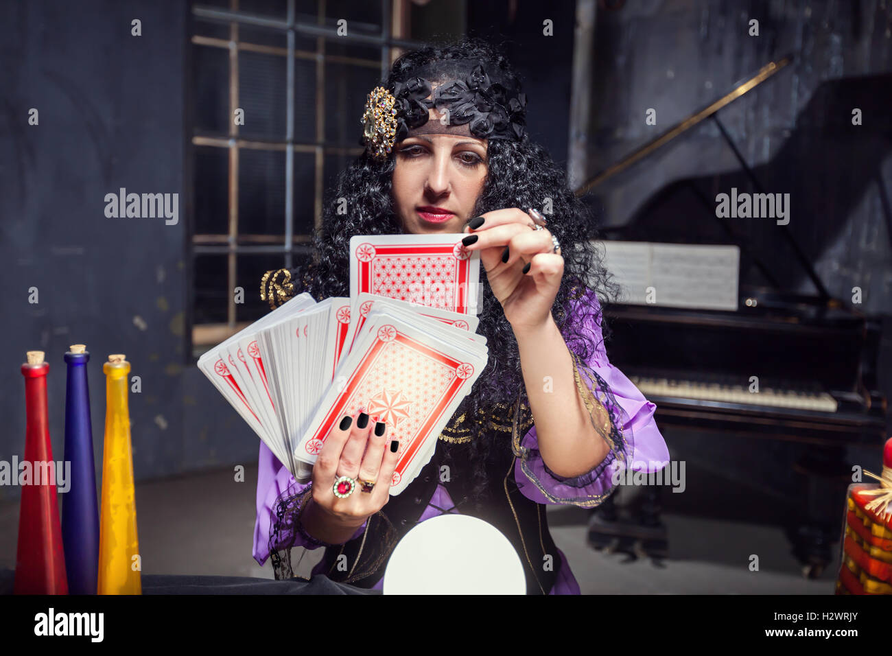 Sorceress while practising witchcraft Stock Photo - Alamy
