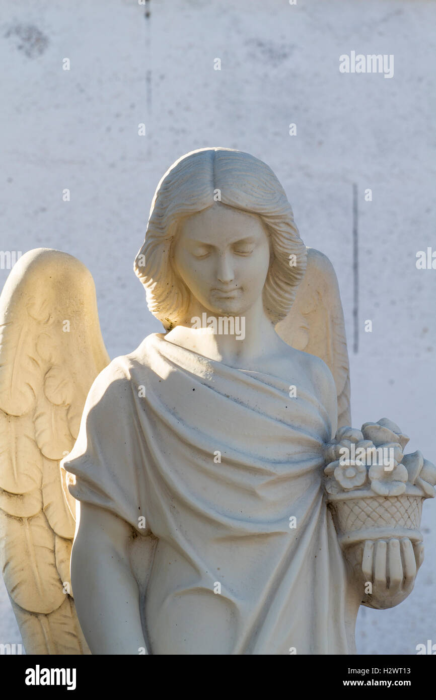 beautiful stone angel on a cemetery Stock Photo - Alamy