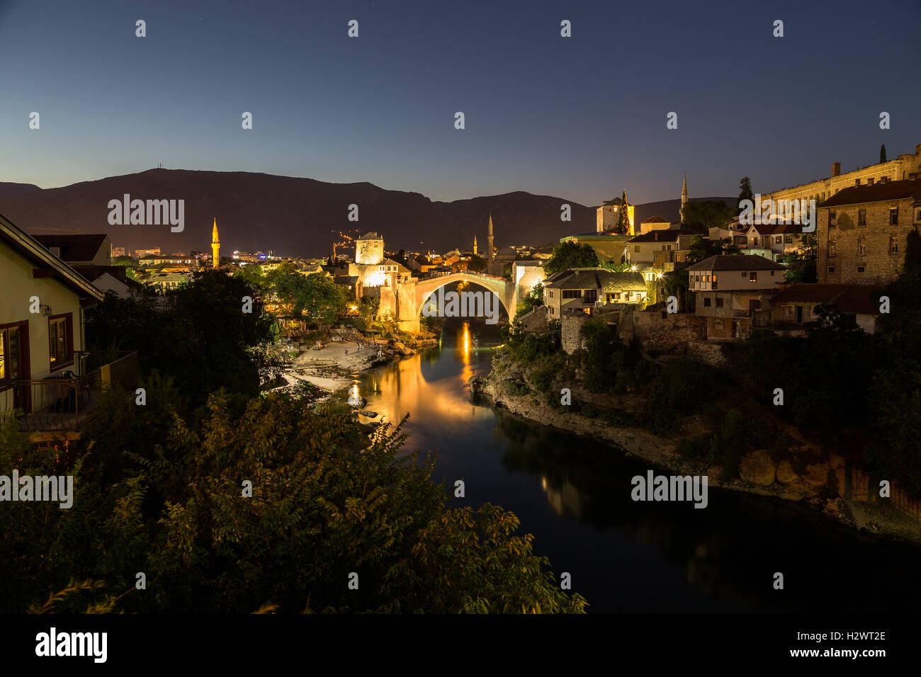 A view of the Mostar skyline at night towards the Old Bridge (Stari ...
