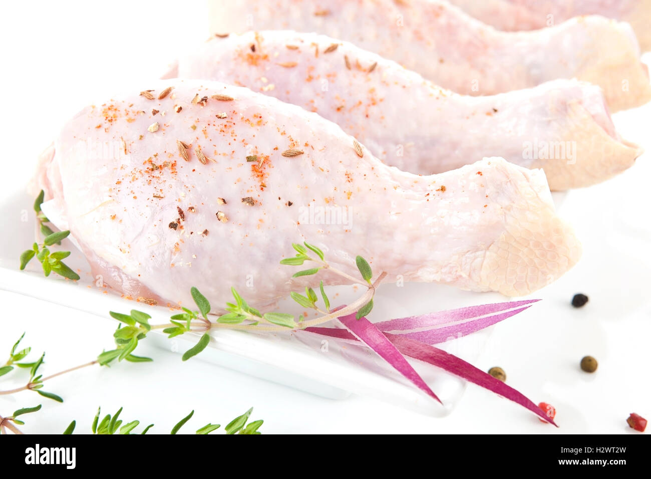 Raw chicken legs Stock Photo - Alamy