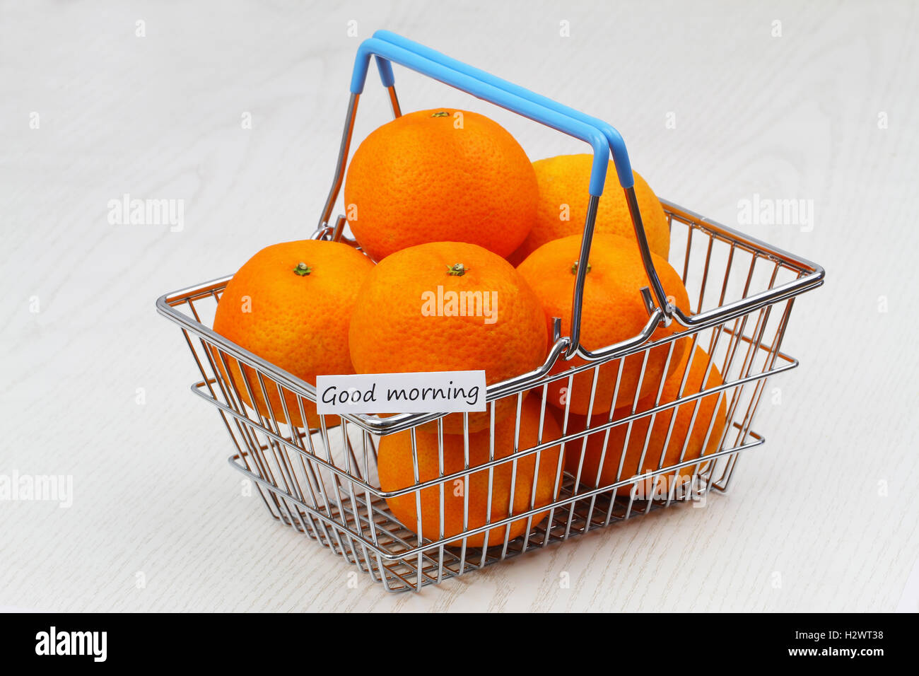 Good morning card with mini shopping basket full of mandarines Stock ...