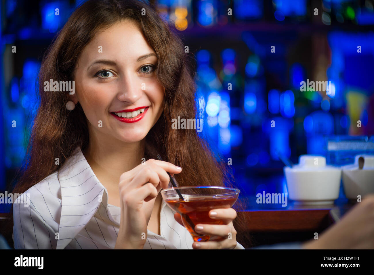 young woman in a bar Stock Photo - Alamy