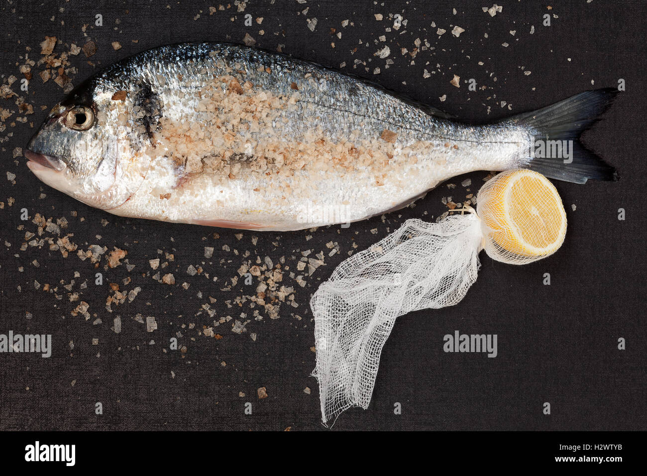 Sea salt flakes with lemon hi-res stock photography and images - Alamy