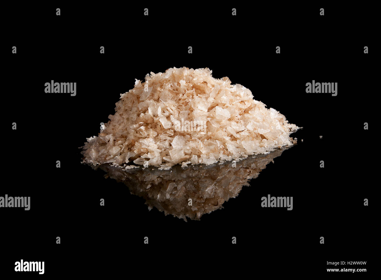 Salt flakes pile isolated Stock Photo - Alamy