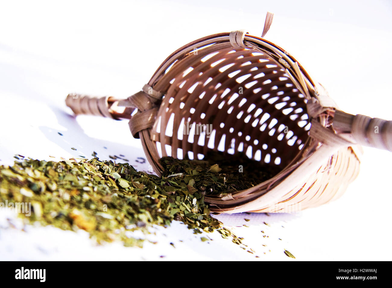 Green tea with bamboo tea strainer on white background Stock Photo - Alamy