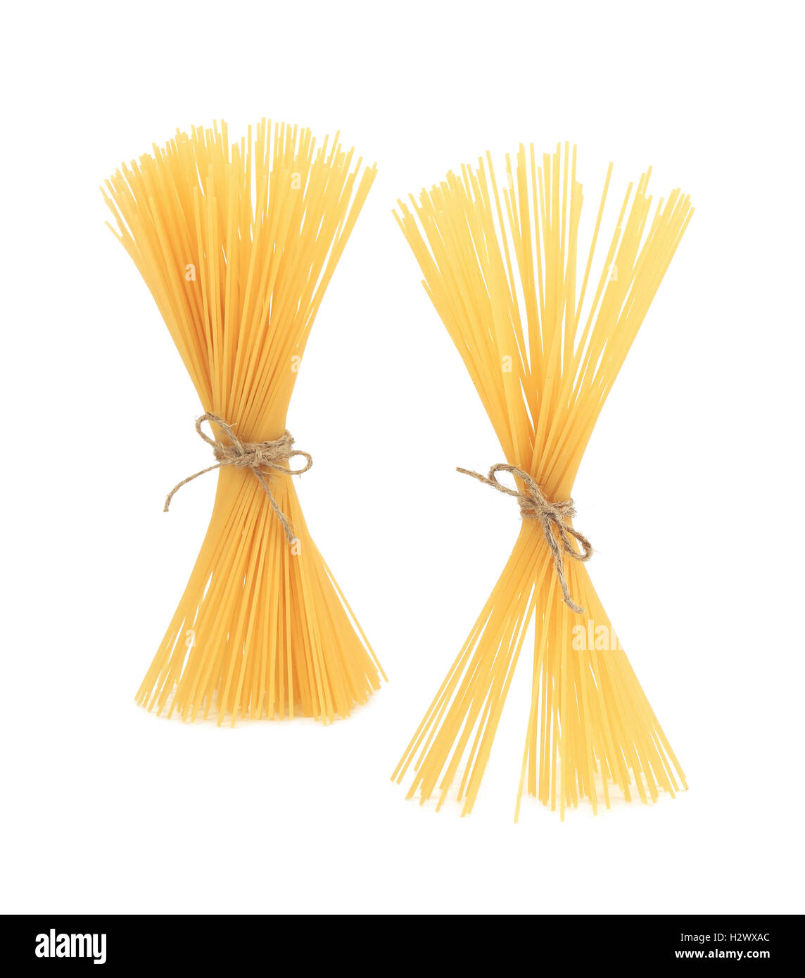 Raw spaghetti pasta Stock Photo - Alamy