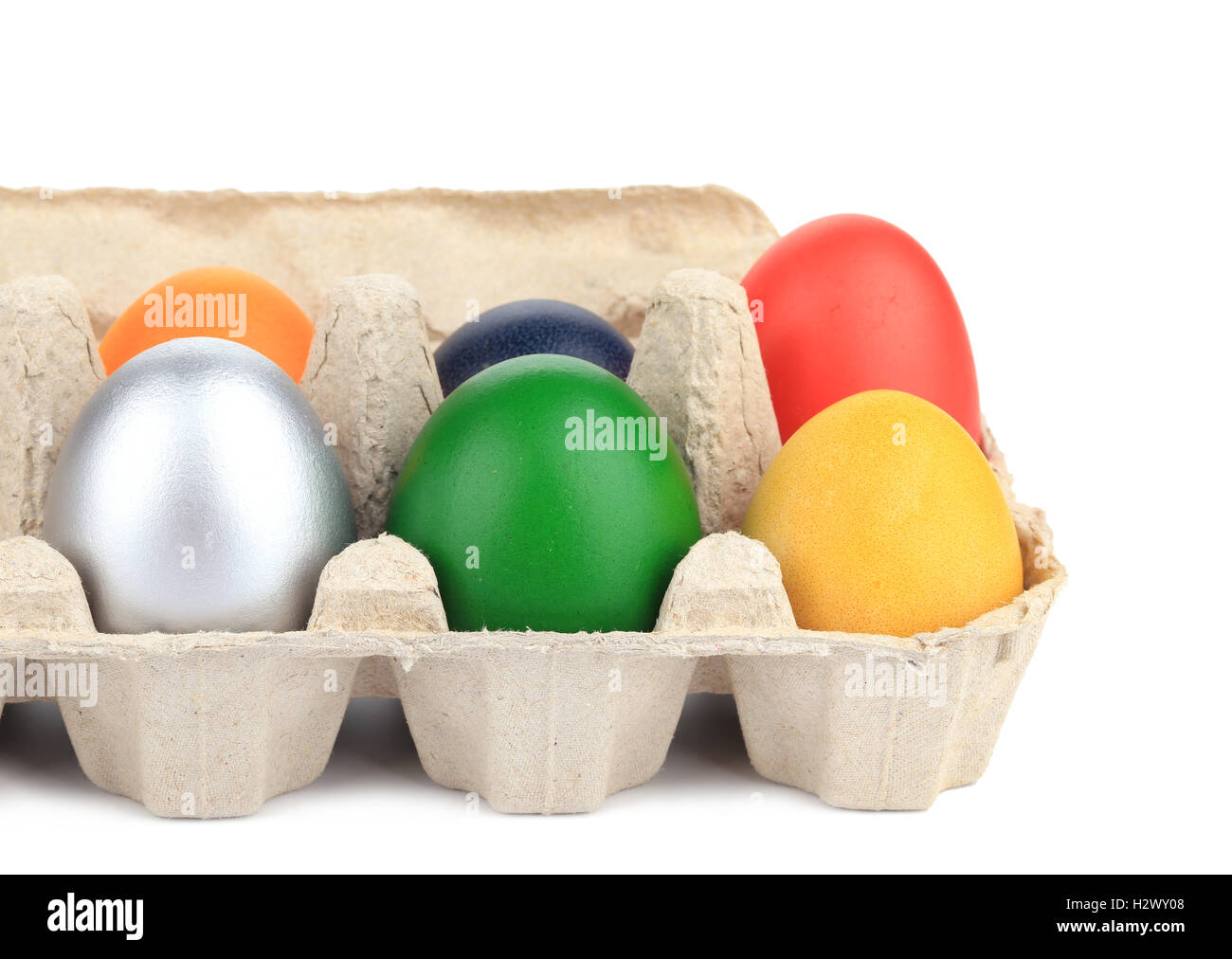 Cardboard egg box with colorful eggs Stock Photo - Alamy