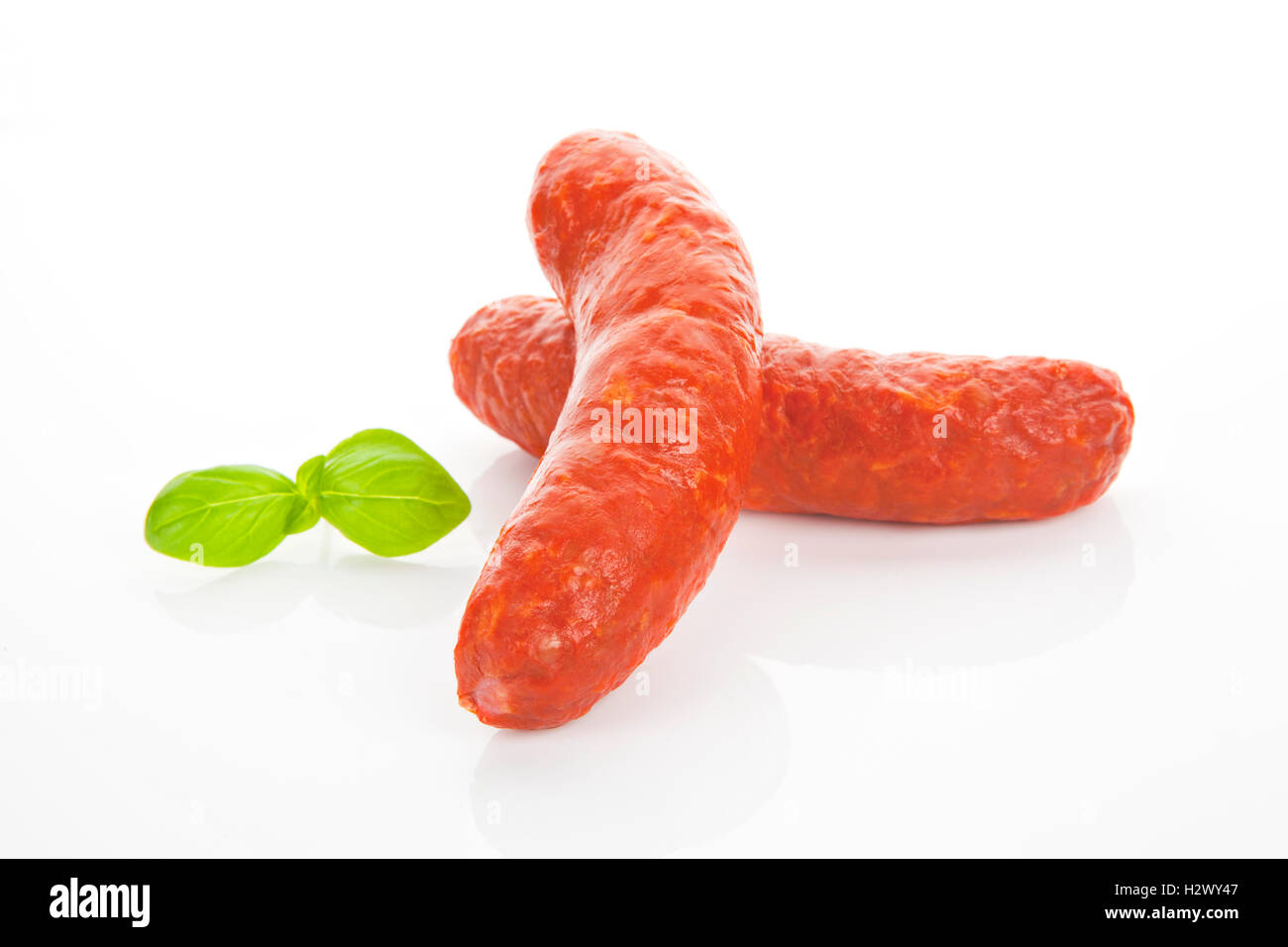 Two sausages isolated Stock Photo - Alamy