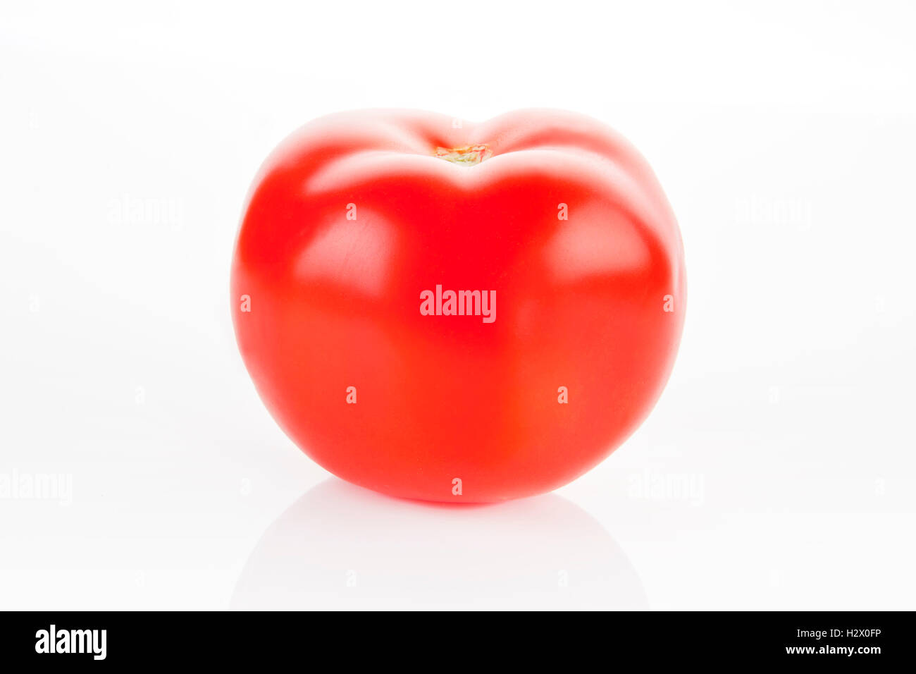 Ripe tomato isolated Stock Photo - Alamy
